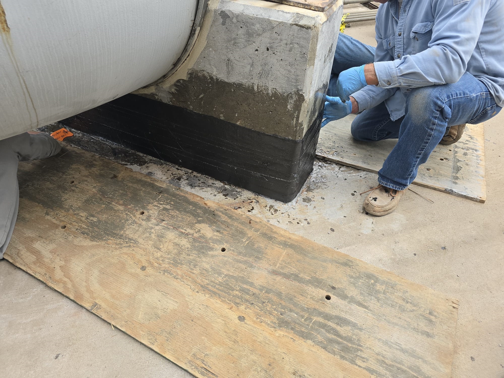 Belzona Super wrap on a concrete stand for a pipe at a power station